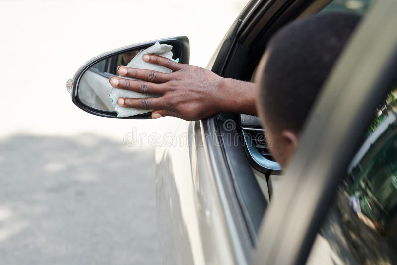 Driver Cleaning Back View Mirror Stock Photo - Image of clean, soft ...