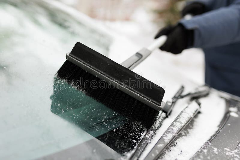 Driver Cleaning His Car with Brush after a Snowfall Stock Image - Image ...