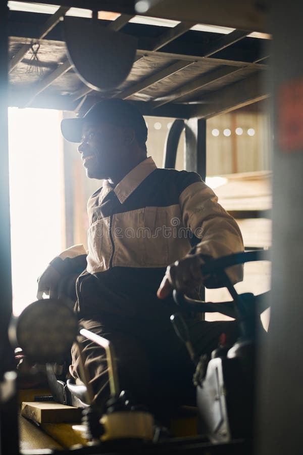 Driver Controlling the Loader in Warehouse Stock Image - Image of ...