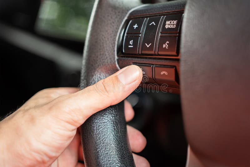 A Driver is Controlling on Multifunction Steering Wheel. Stock Photo ...