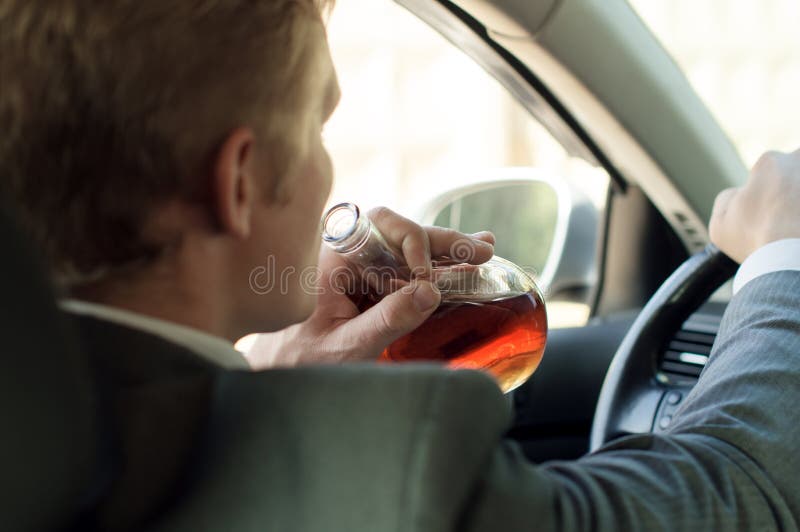 Driver Drinks Alcohol Behind the Wheel Stock Photo - Image of attention ...