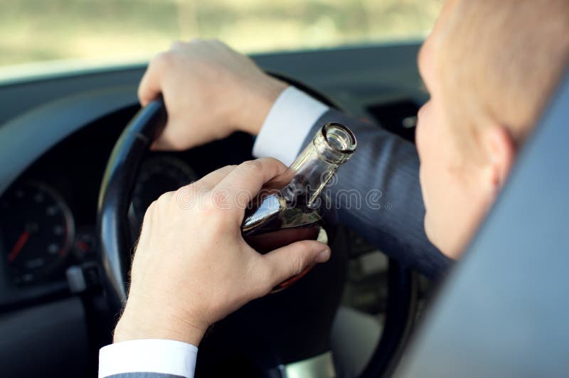 Driver Driving a Car with Alcohol Stock Image - Image of alcohol ...