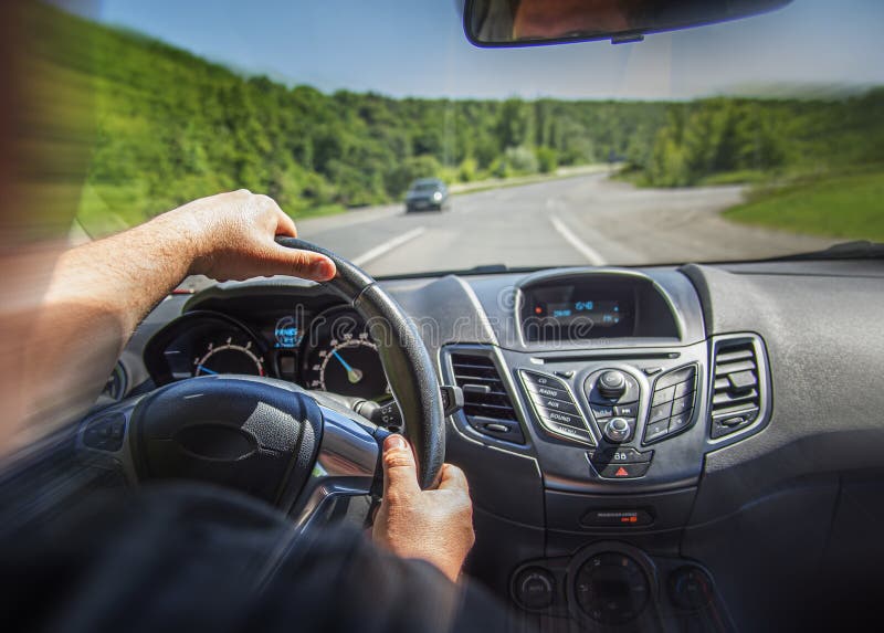 Driver is Driving the Car on the Highway. Stock Photo - Image of light ...