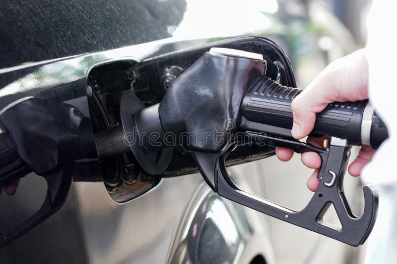 A Driver Fills a Car with Fuel at a Gas Station Stock Image - Image of ...