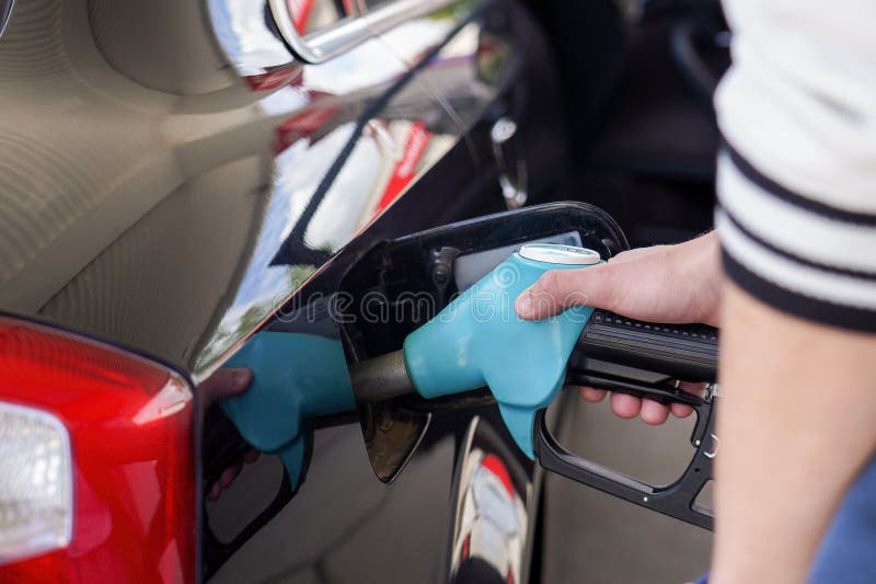 The Driver Fills His Car with Flammable Fuel Stock Photo - Image of ...