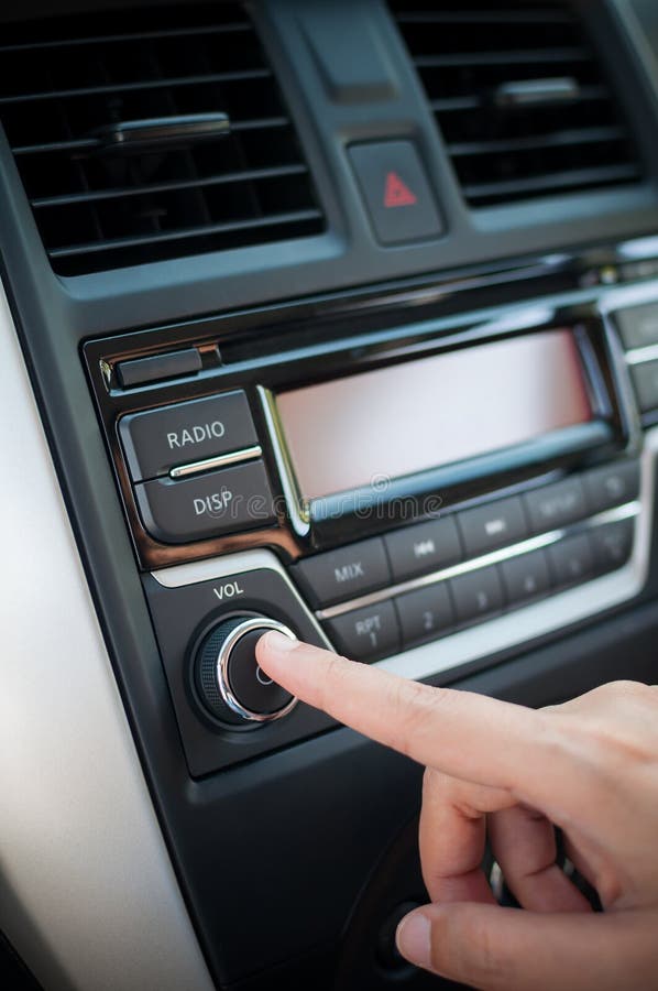 Driver Finger Pushing Button of Car Audio Player. Stock Image - Image ...