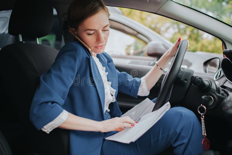 The Driver Going on the Road, Speaking on the Phone, Working with ...