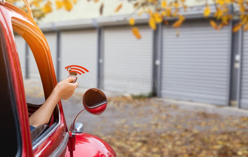 Driver Hand Holding a Remote, Using a Remote Control, Electric Sliding ...