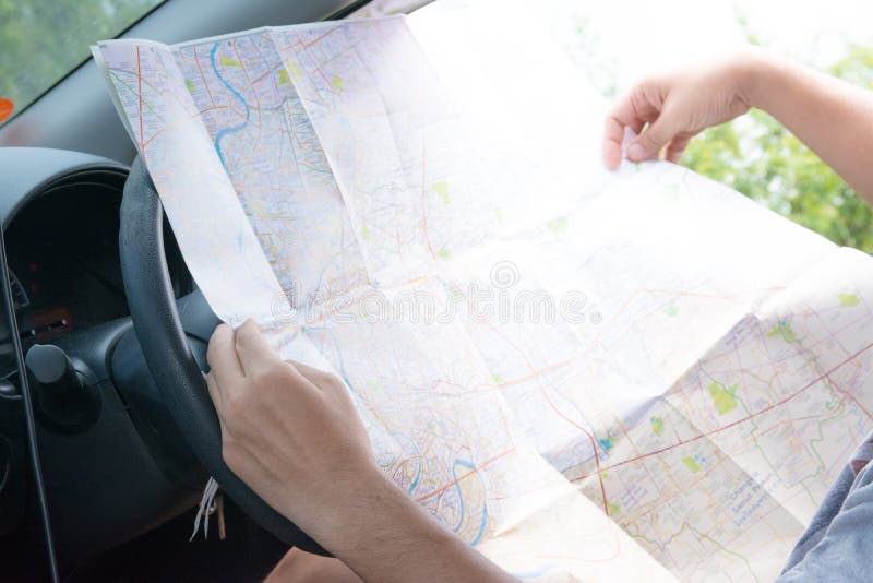 Driver looking on map stock image. Image of drive, adult - 116609079