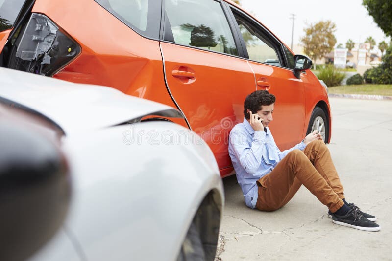 Driver Making Phone Call after Traffic Accident Stock Photo - Image of ...