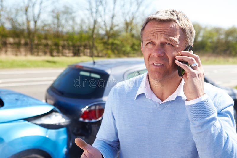 Driver Making Phone Call after Traffic Accident Stock Photo - Image of ...
