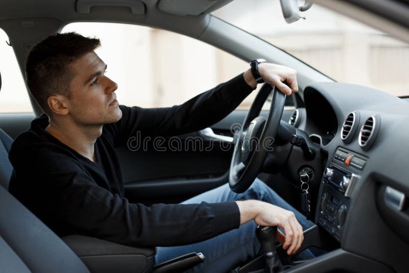 Male Driver Sitting in Car in Traffic Jam and Looking at Clock. Stock ...