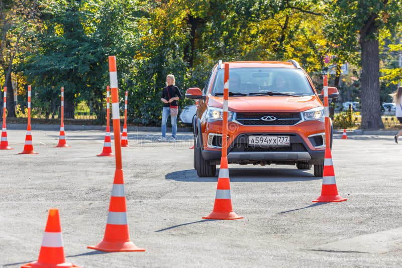 The Driver on the New Car Passes the Driving Test for Driving the Car ...
