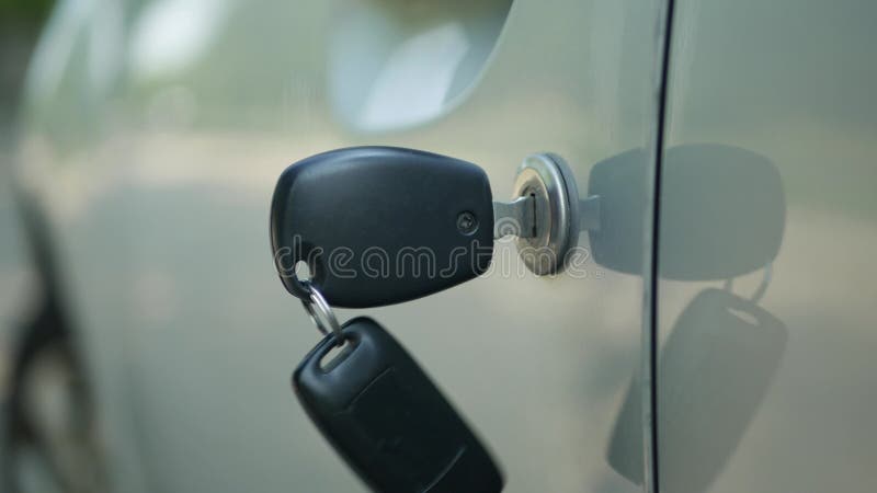 Driver Open and Closes the Car Door with the Keys and the Remote ...