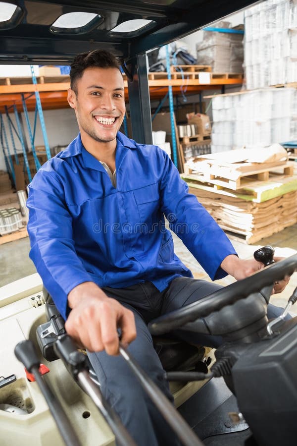 Driver Operating Forklift Machine in Warehouse Stock Image - Image of ...