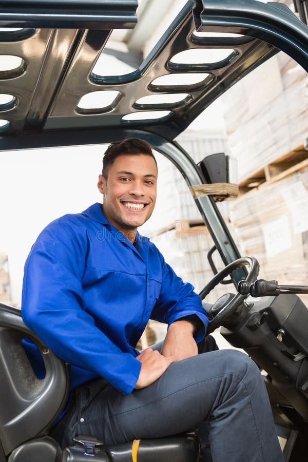 Driver Operating Forklift Machine in Warehouse Stock Image - Image of ...