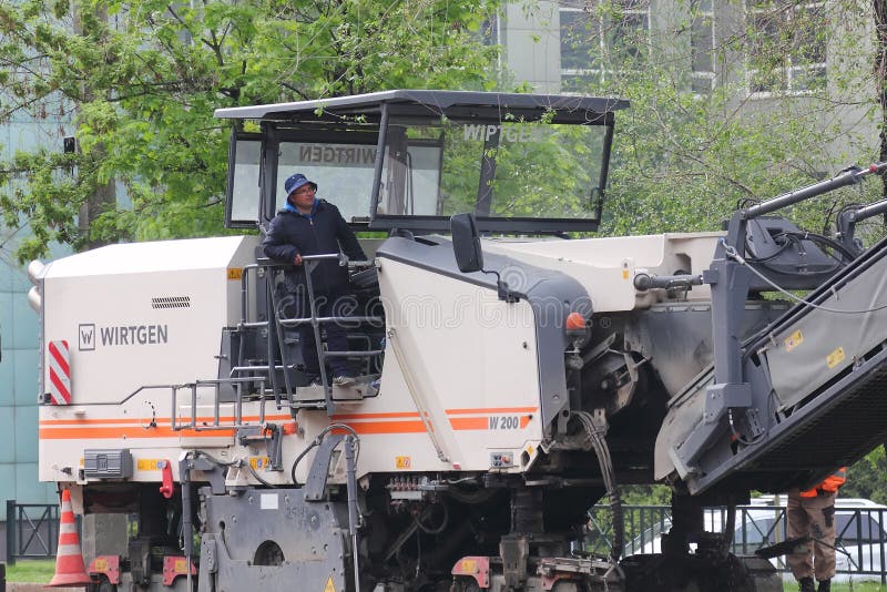 Driver-operator for the Management of the Road Cutter. Editorial Stock ...