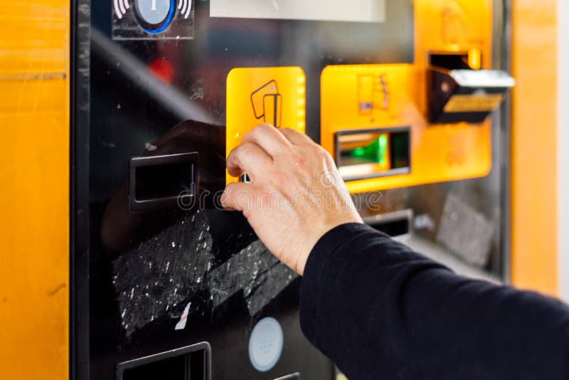 Driver Paying by Card at a Motorway ATM Stock Photo - Image of ...