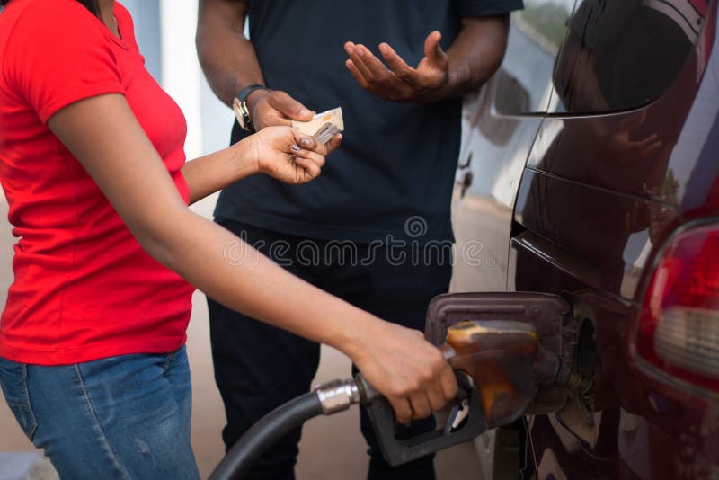 Driver paying for fuel stock image. Image of buying - 265132787