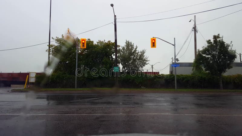 Waiting at Red Light Along Busy City Traffic Light Intersection in ...