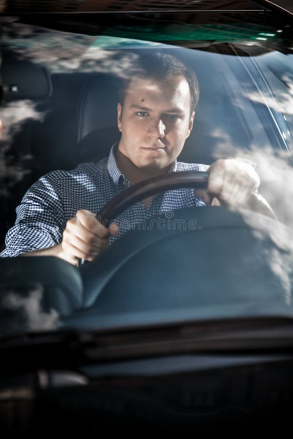 Driver Portrait through Glass Stock Photo - Image of handsome, look ...