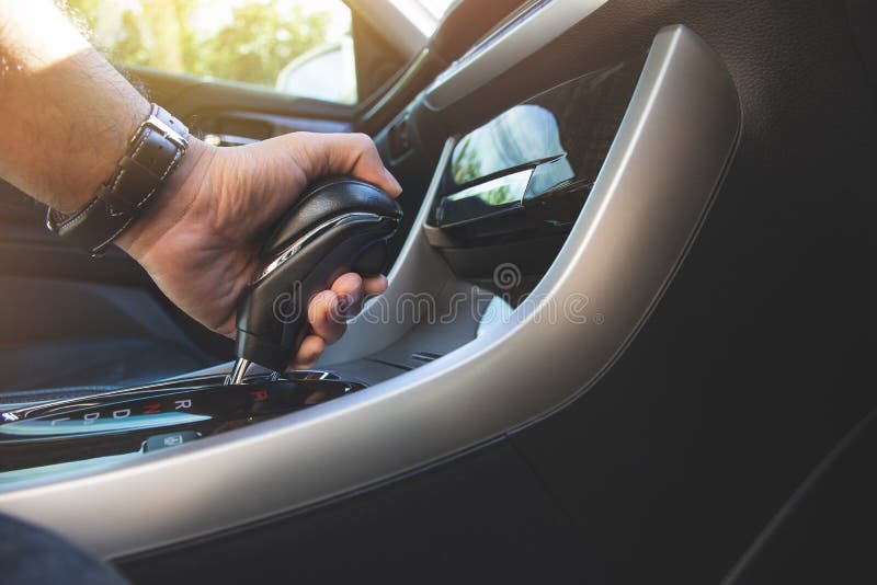 The Driver`s Hand Holds the Gear Lever Stock Photo - Image of leather ...