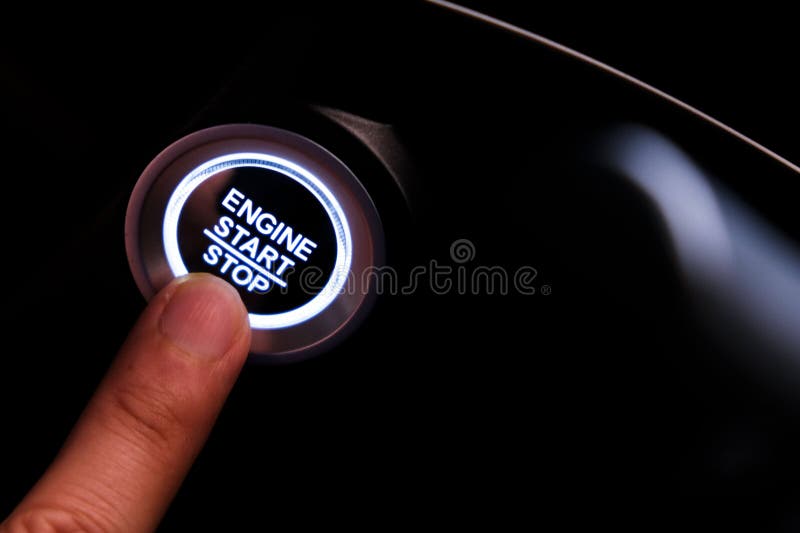The Driver S Hand is Pressing the Car Start Button. Concept of ...
