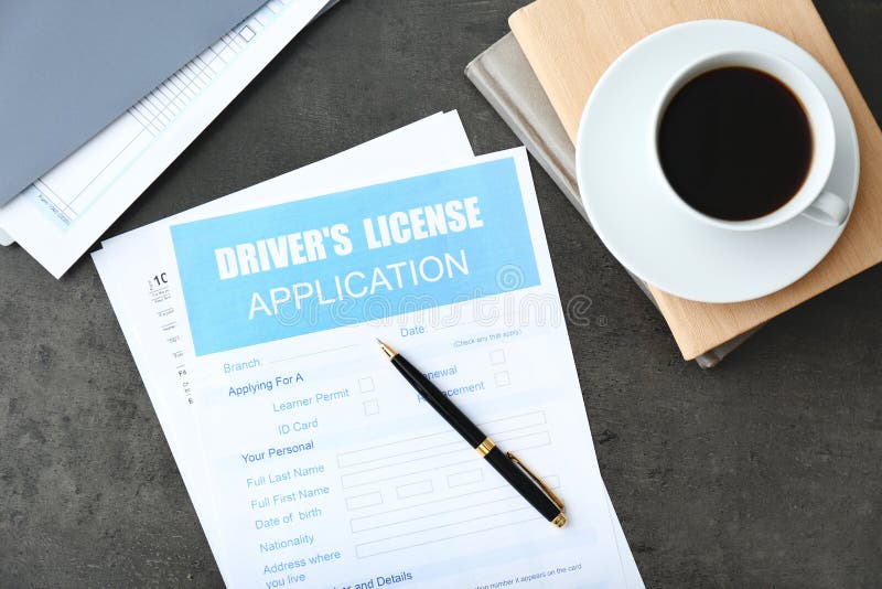 Driver`s License Application Form, Stationery and Cup of Coffee on Grey ...