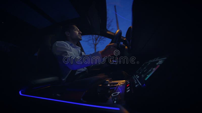 A Nighttime Driving Experience in a Modern Car Interior with Innovative ...