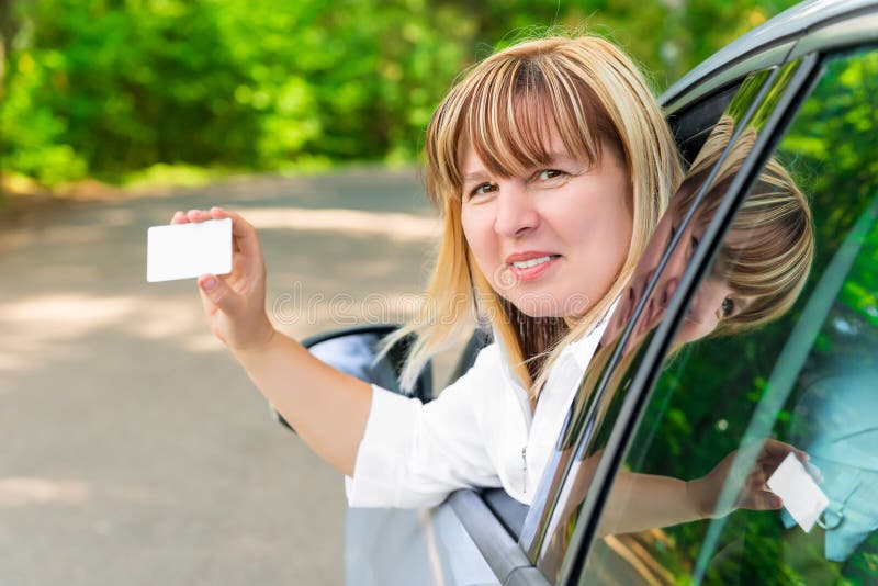 Driver Showing a Blank Card Stock Image - Image of mature, people: 64445559
