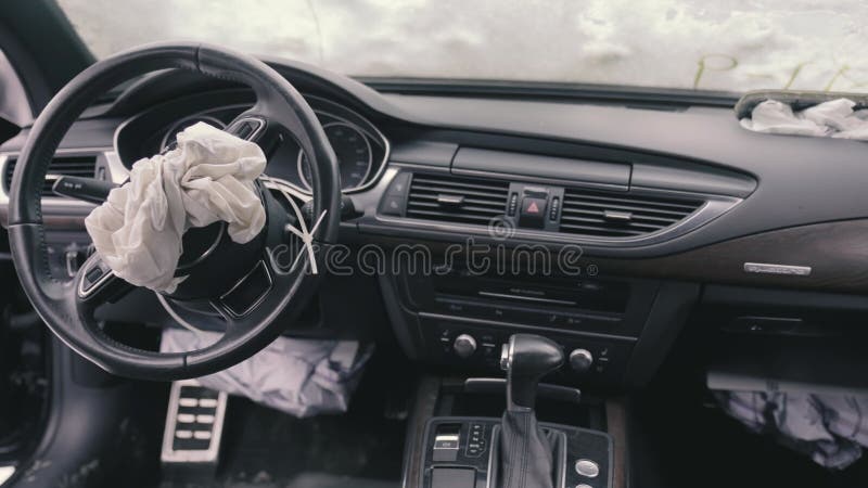 Car Interior after an Accident with Airbags Deployed. View from the ...