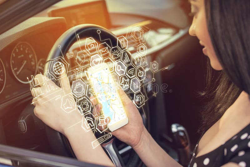 Driver Sitting in a Car and Using Mobile Phone Map App Stock Image ...