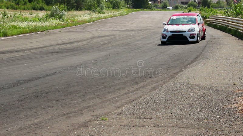 Driver Taking Extremely Sharp Turn, Passing Another Lap in Race Stock ...