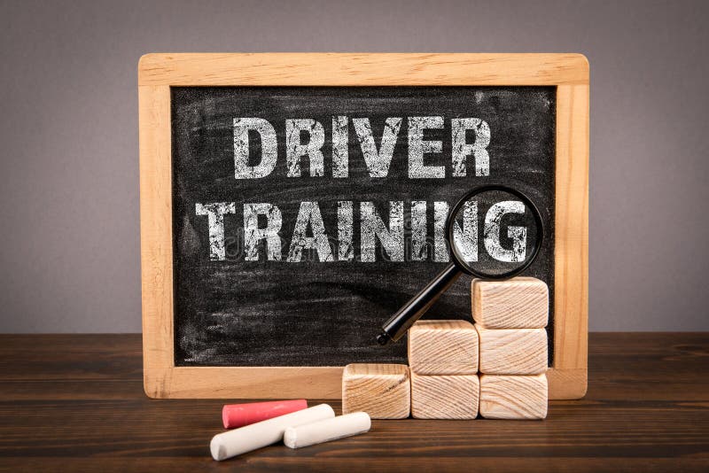 Driver Training. Chalkboard with Text on Wooden Texture Table Stock ...