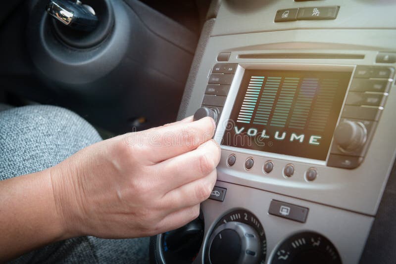 Driver Adjusting Volume in the Car Audio System Stock Image - Image of ...
