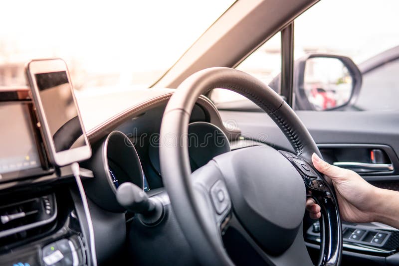 Driver Hand Holding Steering Wheel in the Car Stock Image - Image of ...