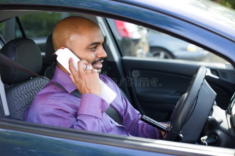 Driver using mobile phone stock image. Image of carpark - 60997197 Driver using mobile phone stock image. Image of carpark - 60997197