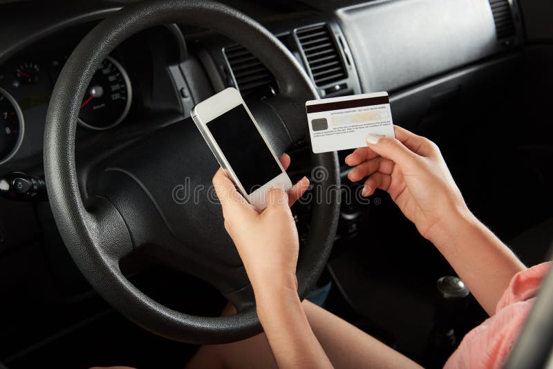 Driver Using Smartphone and Credit Card Stock Photo - Image of bill ...