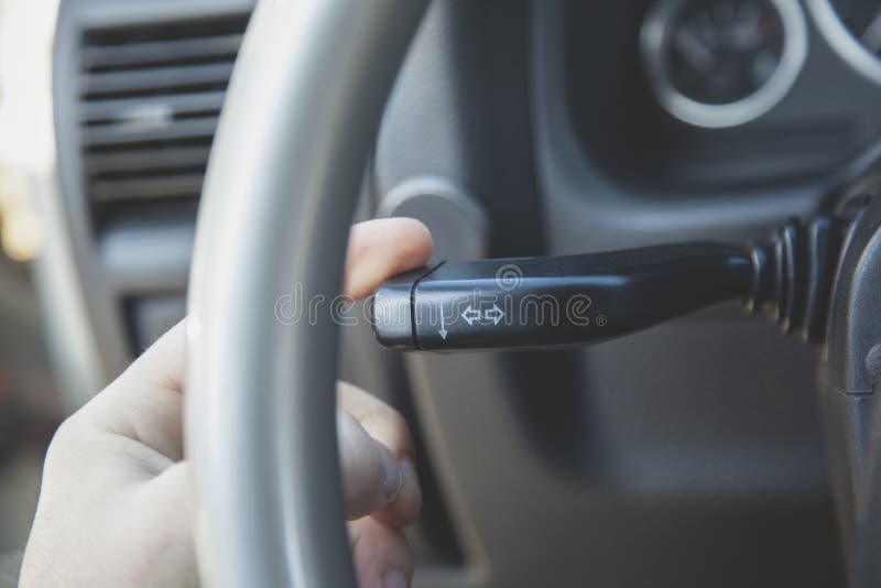Driver Using Turn Signal Control Light in Car Stock Image - Image of ...