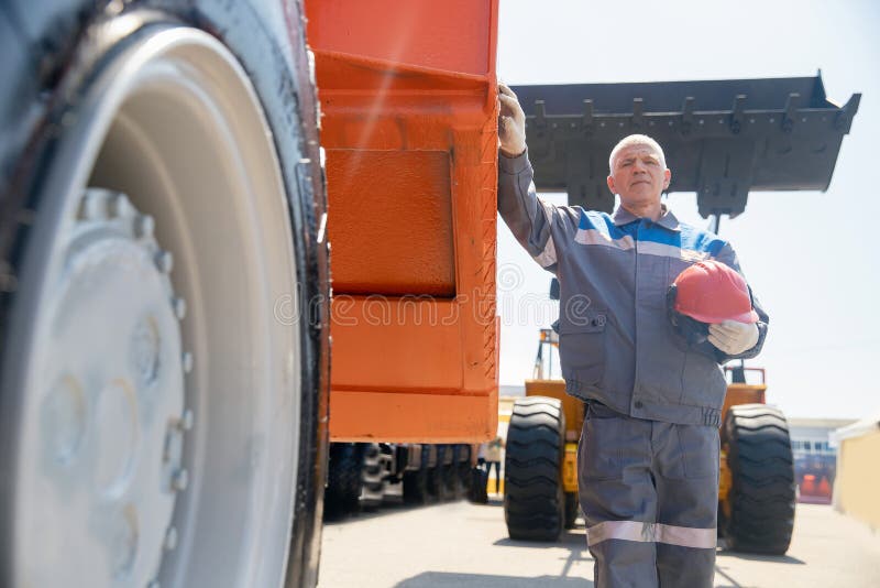 Driver Yellow Big Truck on Coal at Open Pit Mining. Concept Industry ...