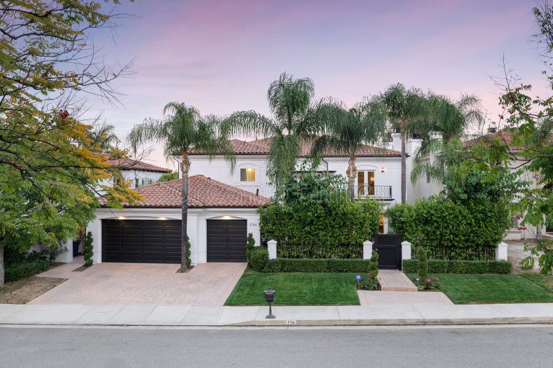 Driveway Leading To a House with Palm Trees at Sunset Stock Image ...