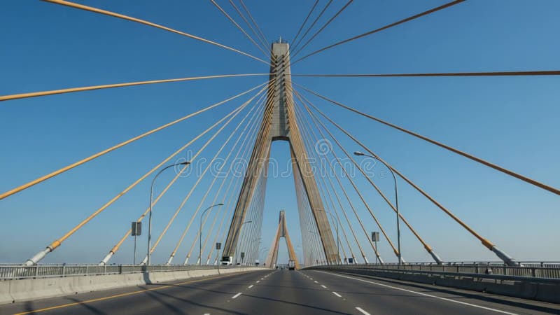 Driving Across the Modern Cable-Stayed Bridge on a Sunny Day Stock ...
