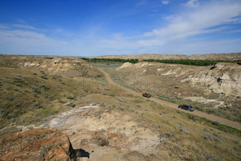 Driving through Badlands stock image. Image of dinosaur - 12403283