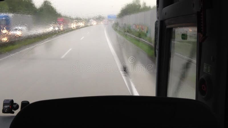 Bus driving at rainy day stock footage. Video of window - 109433466