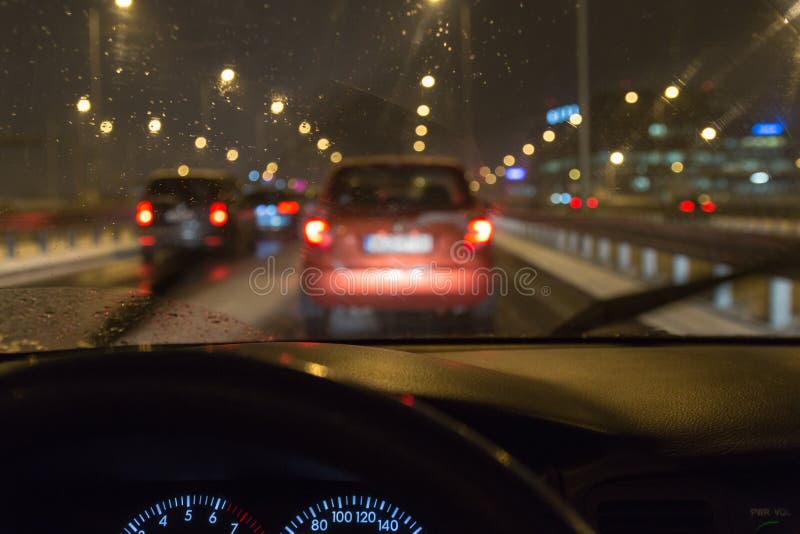 Driving a Car in a Bad Weather, in Traffic Jam Stock Photo - Image of ...