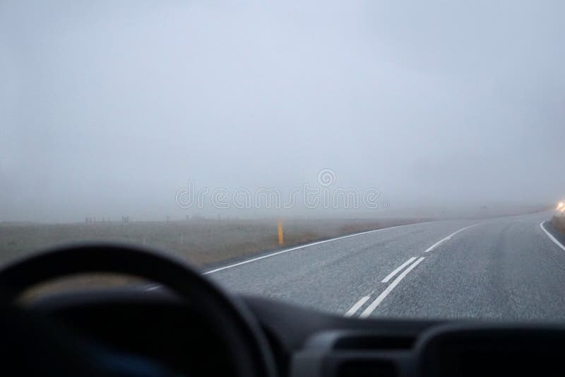 Driving a Car in Fog - Perspective of a Driver Stock Photo - Image of ...