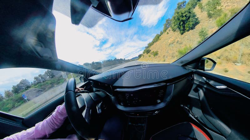 Driving a Car in a Highway with Wide Windshield and Wide Angle View ...