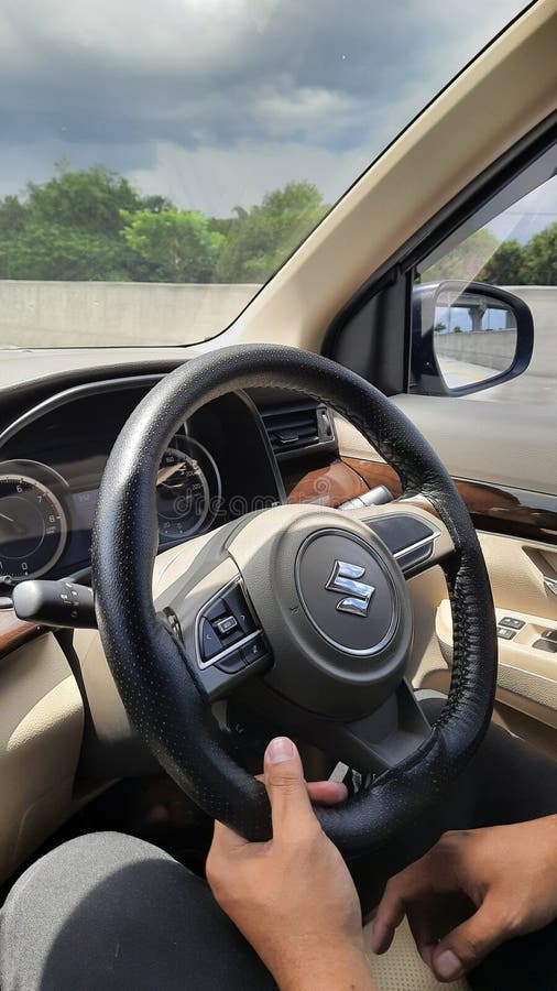 Driving car with one hand editorial image. Image of vehicle - 261707240