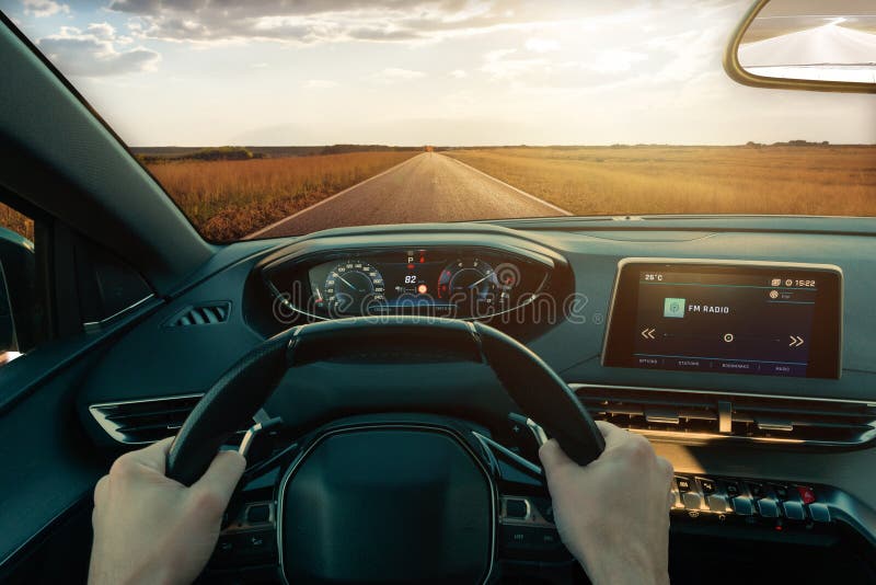 Driving Car through a Perfect Road through Fields Illuminated by ...