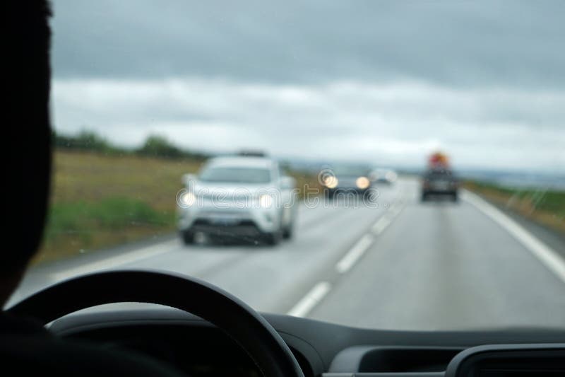 Driving a Car - Perspective of a Driver - Bokeh Effect Stock Photo ...